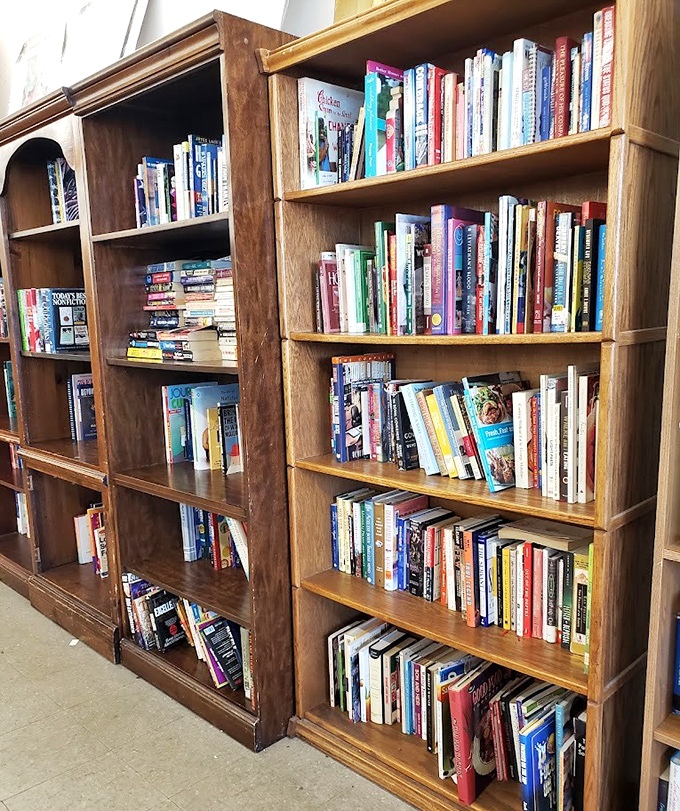 Books packed tighter than a subway car at rush hour, each spine holding worlds waiting to unfold.