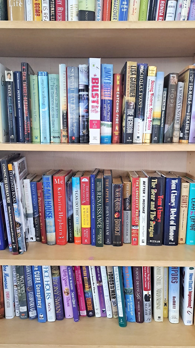 The book section: where literary treasures await at paperback prices. Spot that Tom Clancy collection? Someone's loss is your rainy weekend gain.