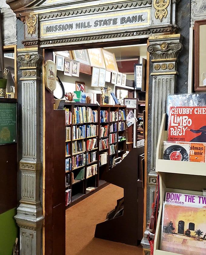 The old bank entrance now guards literary treasures instead of money—arguably a more valuable currency for the soul.