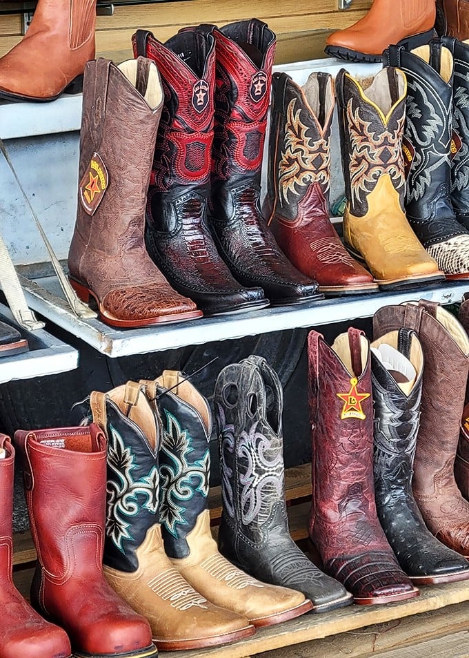 Cowboy boots displaying intricate stitching and bold colors that would make any rhinestone cowboy smile with pure appreciation.