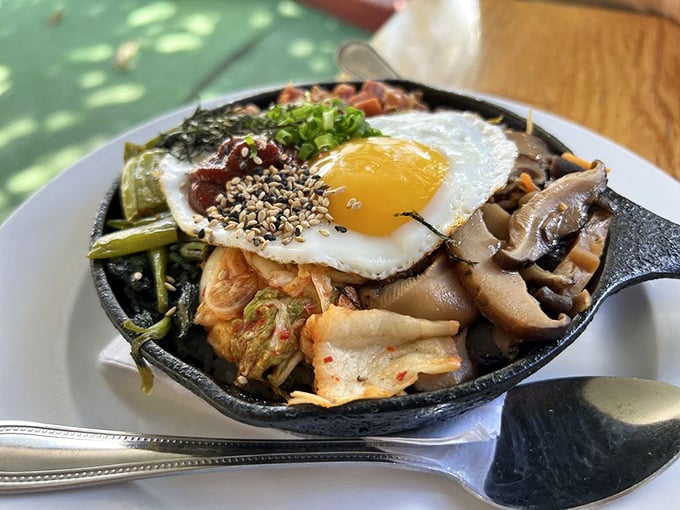 The Breakfast Bibimbap &ndash; where Hawaii meets Korea in a sizzling skillet of morning glory. That egg is just begging to be broken.
