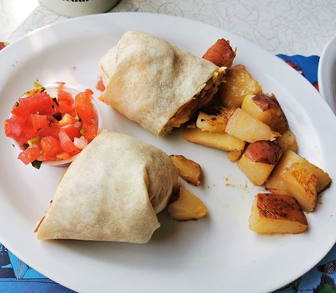 Breakfast burritos stuffed with everything good in life, served with potatoes that achieve peak golden-brown excellence every single time.
