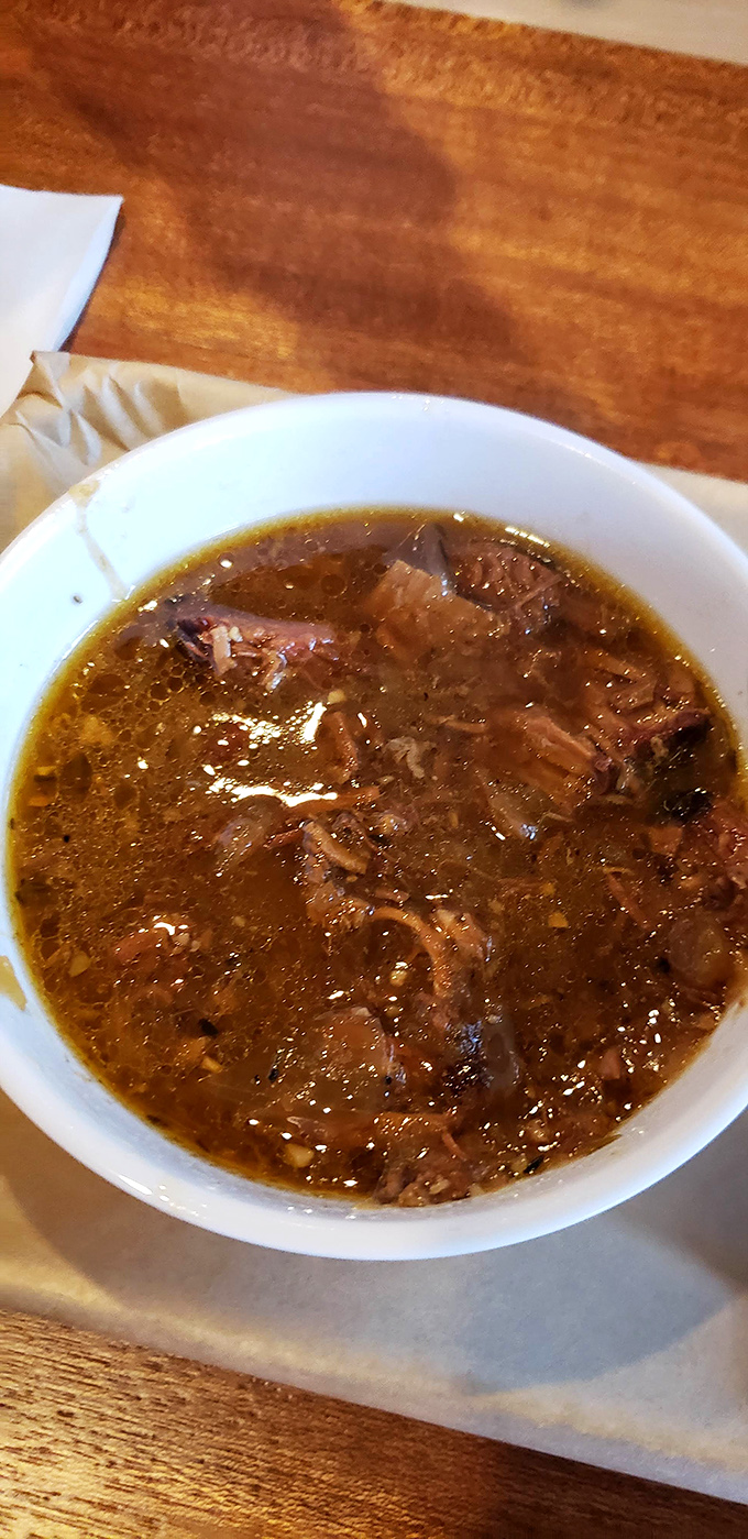 A rich, amber-hued soup that's essentially liquid barbecue &ndash; meat and broth in perfect harmony, like a carnivore's version of liquid gold.