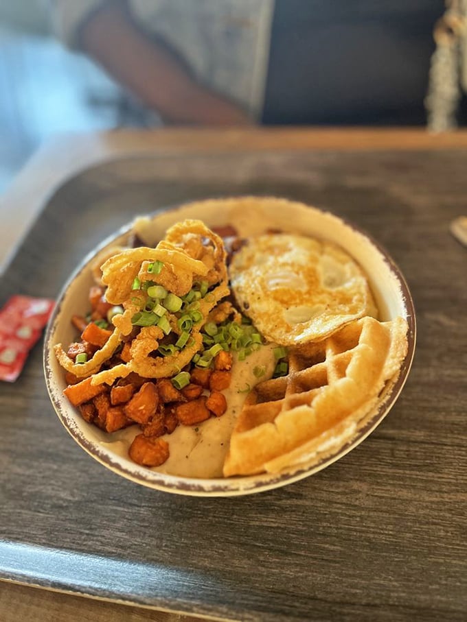 A waffle, fried chicken, and egg living together in perfect harmony&mdash;like the Crosby, Stills & Nash of breakfast bowls. 