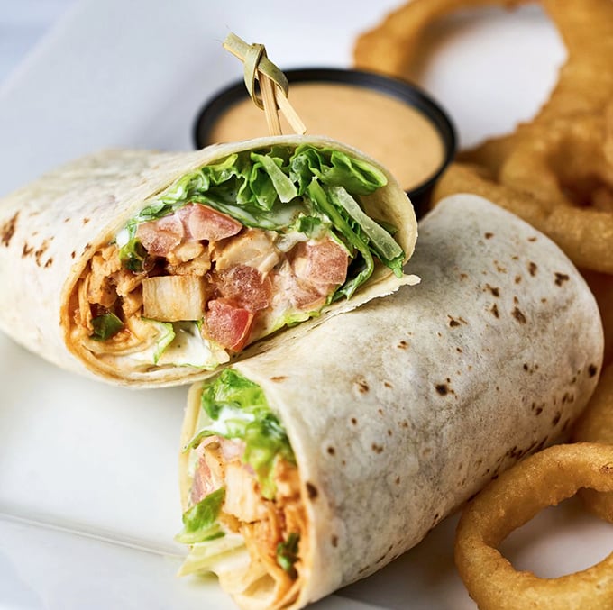 This isn't just a wrap&mdash;it's a perfectly engineered handheld feast where crisp lettuce, savory protein, and that touch of sauce achieve the elusive lunch harmony we all seek.