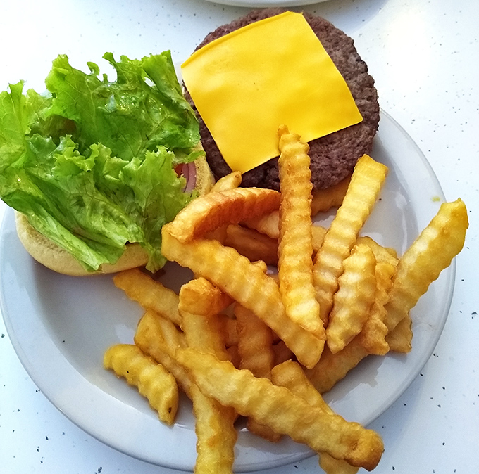 Sometimes simplicity wins: a classic burger and crinkle-cut fries that transport you back to pre-foodie America.