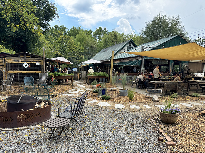 Rustic charm meets culinary comfort at this outdoor gathering space. Where gravel underfoot means good times ahead.