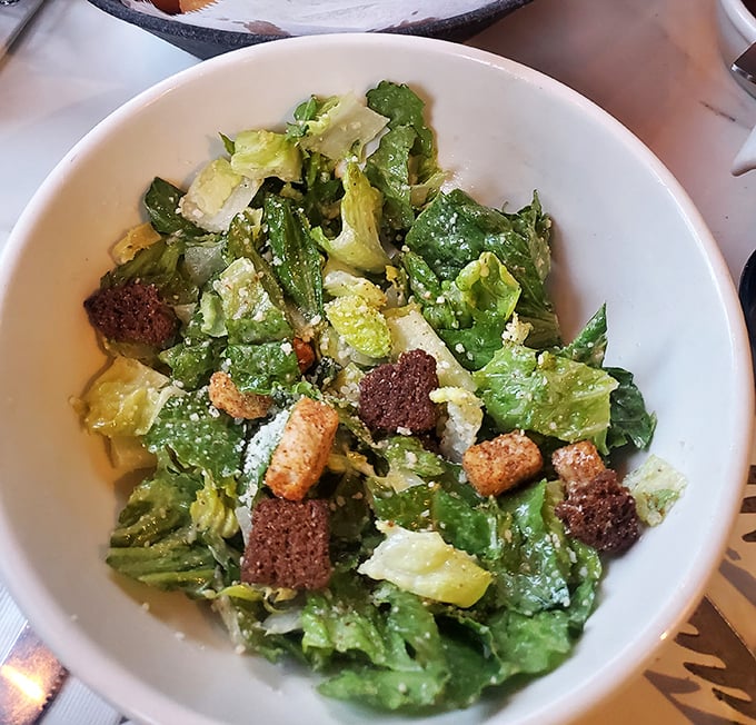 Even the salad looks like it's having more fun here&mdash;crisp, bright, and hanging out with croutons that clearly grew up in a good neighborhood.