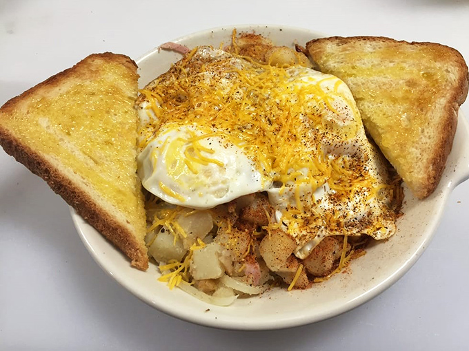 Breakfast that understands the importance of proper potato-to-egg ratio, with toast standing by for crucial yolk-sopping duties&mdash;morning perfection on a plate.