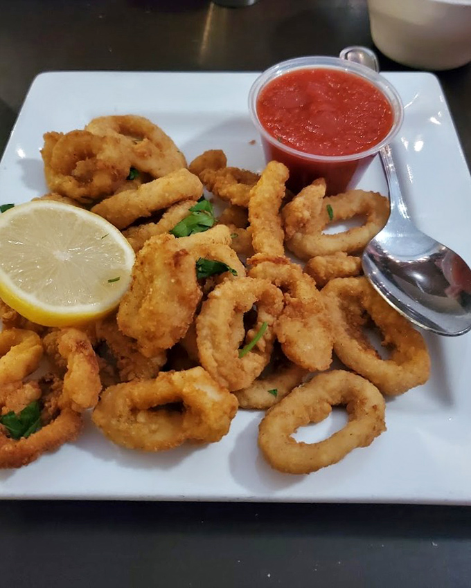 Calamari so perfectly fried it makes you wonder why anyone would ever order it anywhere else. The crispy-tender paradox, solved.