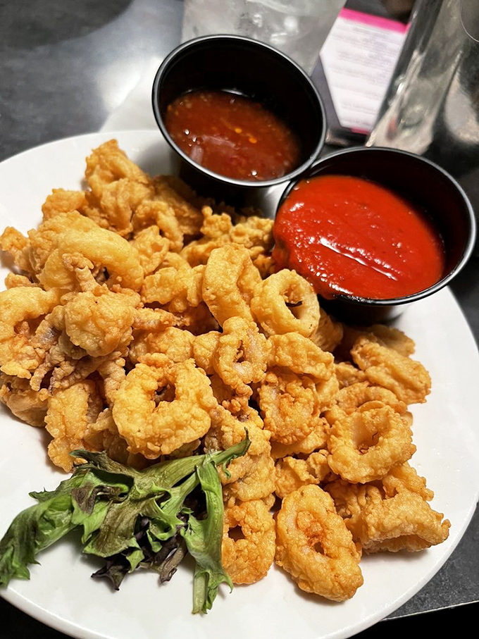 Calamari so light and crispy, it practically hovers above the plate. Two dipping sauces because life's too short to choose just one.