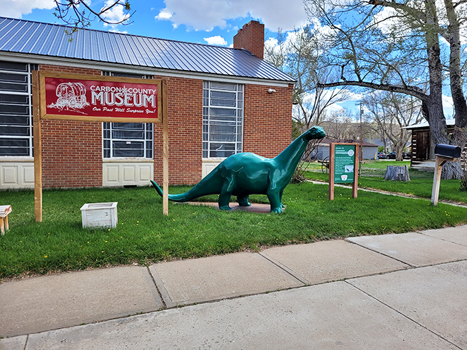 The Carbon County Museum's friendly dinosaur greeter suggests Wyoming's history goes back a bit further than the railroad era.