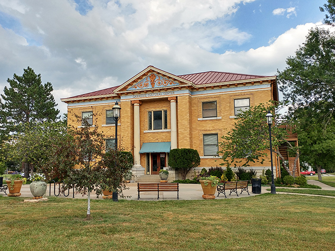 The Carnegie Cultural Center's golden brick facade glows in afternoon light, offering enrichment programs where retirement means expanding horizons, not shrinking bank accounts.