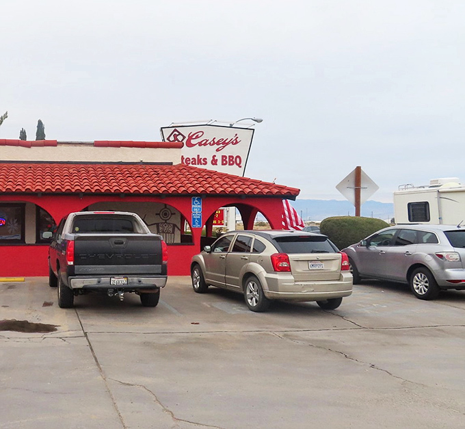 Casey's red-roofed BBQ haven promises the kind of smoky delights that make you forget you're in the desert, not the Deep South.