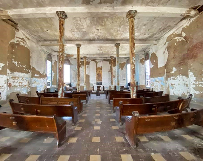 Even in decay, the prison chapel maintains a haunting dignity. Those weathered pews have heard more desperate prayers than most houses of worship ever will.