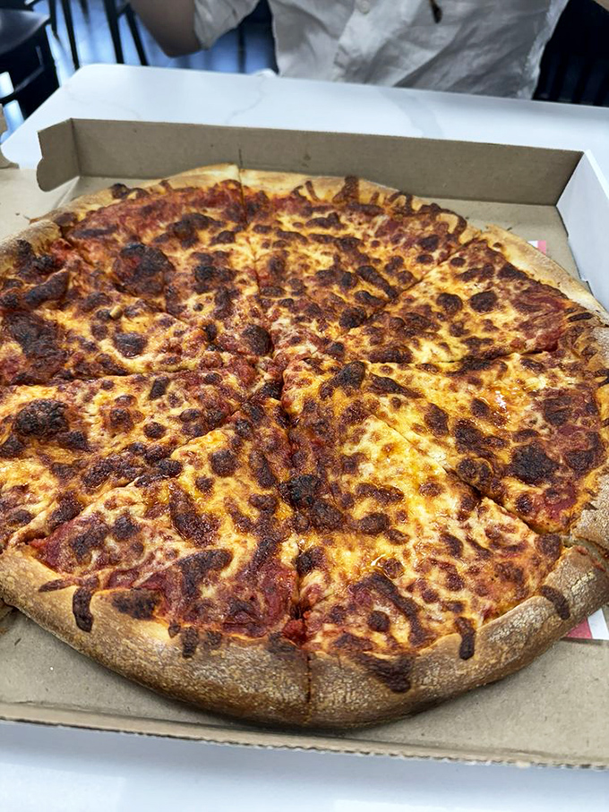 Sometimes simplicity wins &ndash; a classic cheese pizza with that perfect balance of sauce, cheese and a crust that's both chewy and crisp.