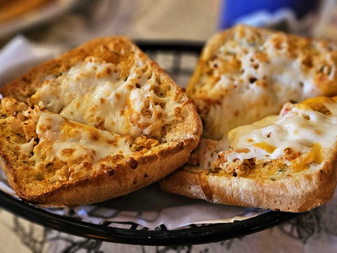 Melted cheese bubbling over a toasted English muffin &ndash; proof that sometimes the simplest combinations deliver the most satisfaction.