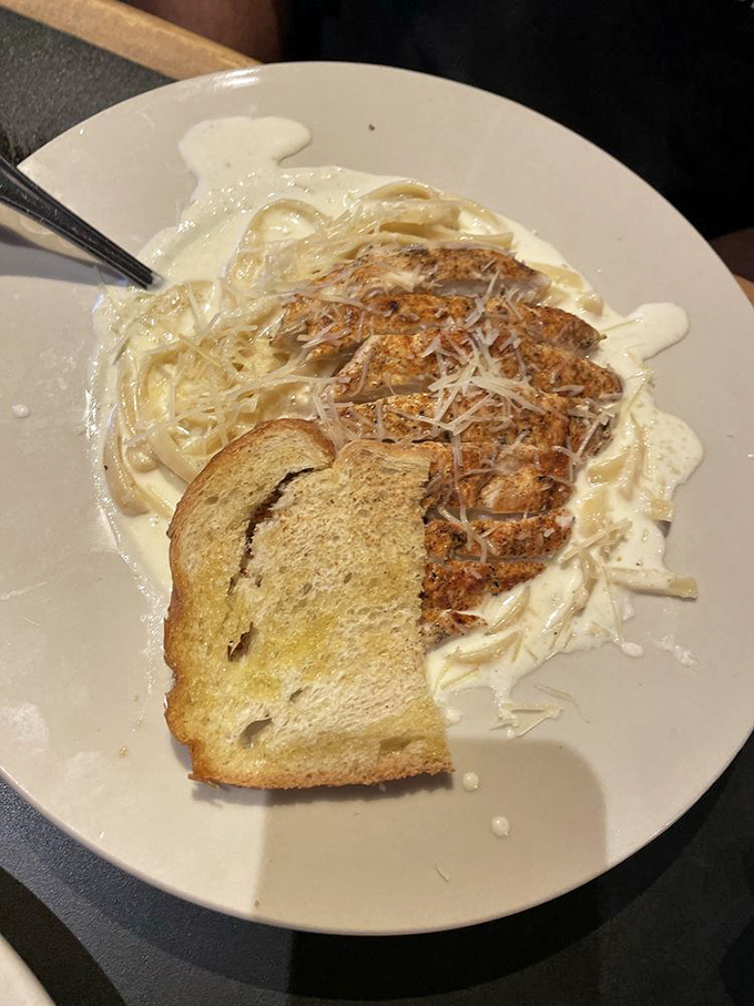 Pasta that doesn't need a passport to transport you to comfort food heaven, with a side of garlic bread for the journey.