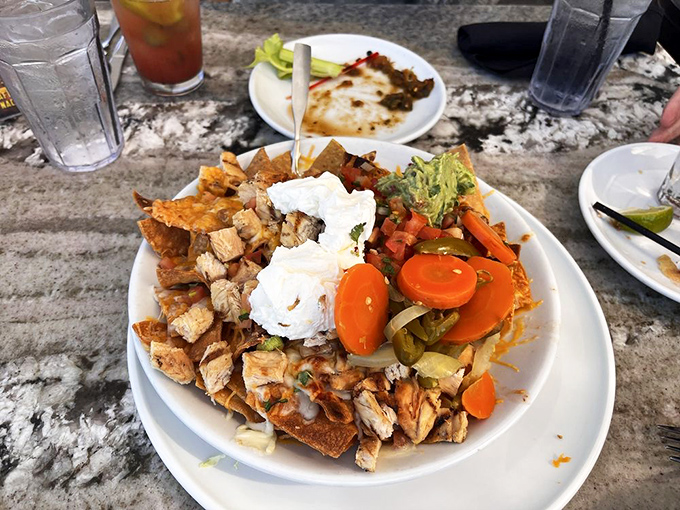 These nachos have more seafood than your average aquarium tour, topped with a dollop of pure California indulgence.