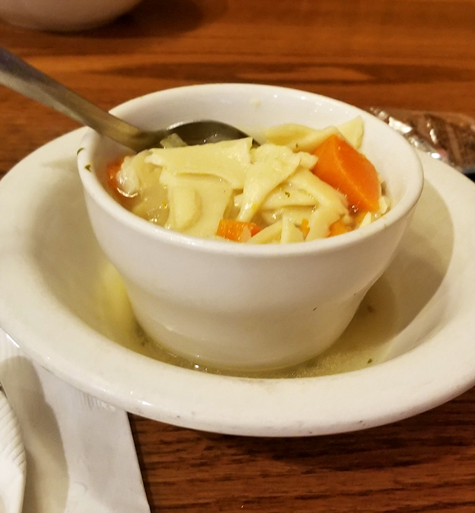 Chicken noodle soup that could heal whatever ails you—the penicillin of comfort food served in an unpretentious white bowl.