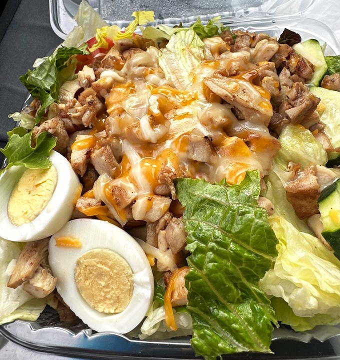 This chicken salad proves healthy eating needn't be punishment&mdash;fresh greens, protein, and hard-boiled eggs create a guilt-free pleasure worth savoring.