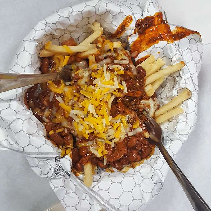 Chili cheese fries: where potatoes go to fulfill their destiny. A beautiful mess that requires both a fork and absolutely zero regrets.