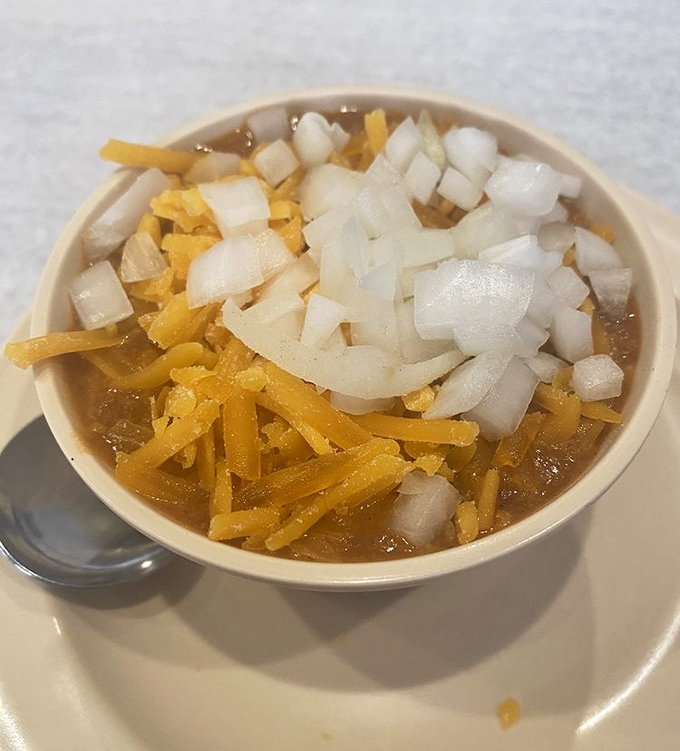 A bowl of chili topped with cheese and onions that could warm the coldest Chicago morning. Simple, honest food that speaks volumes.