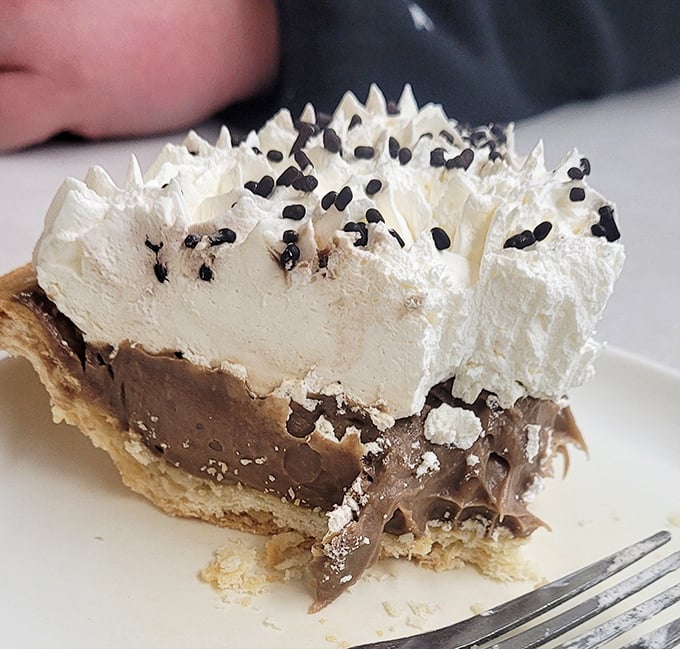 Chocolate cream pie that doesn't need fancy frills &ndash; just honest-to-goodness decadence topped with pillowy whipped cream.