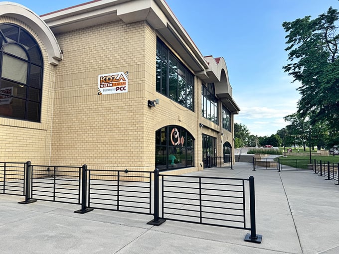 Chop restaurant's modern brick exterior offers a contemporary counterpoint to Pueblo's historic buildings, with park views as the perfect side dish.