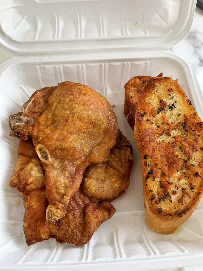 Fried chicken that would make your grandmother jealous&mdash;crackling skin giving way to juicy meat, with garlic bread that refuses to play second fiddle.