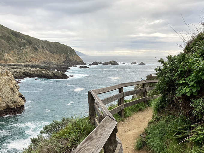 The trail that launched a thousand screensavers. This wooden pathway clings to the cliff like it's afraid of heights but can't resist the view.