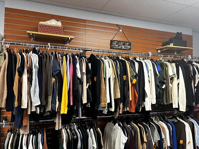 A rainbow of possibilities hangs in perfect order &ndash; each garment a story waiting to be continued in someone else's closet.