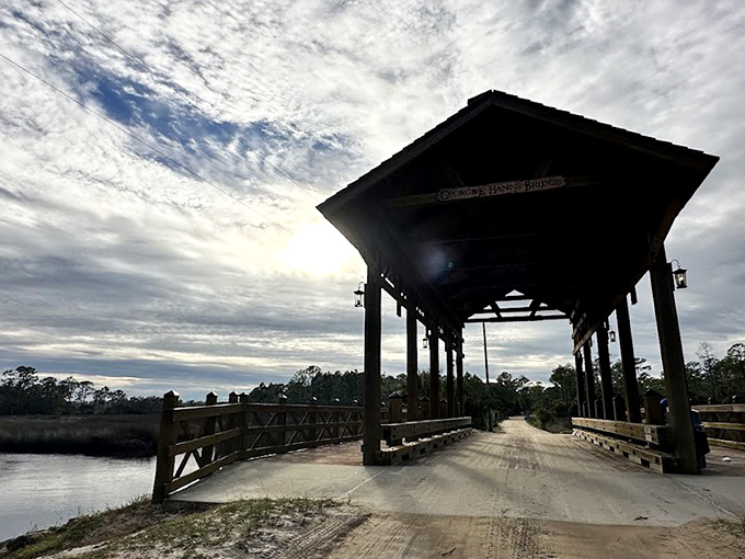 Even on cloudy days, the silhouette of the bridge creates a dramatic frame against the moody Florida sky.