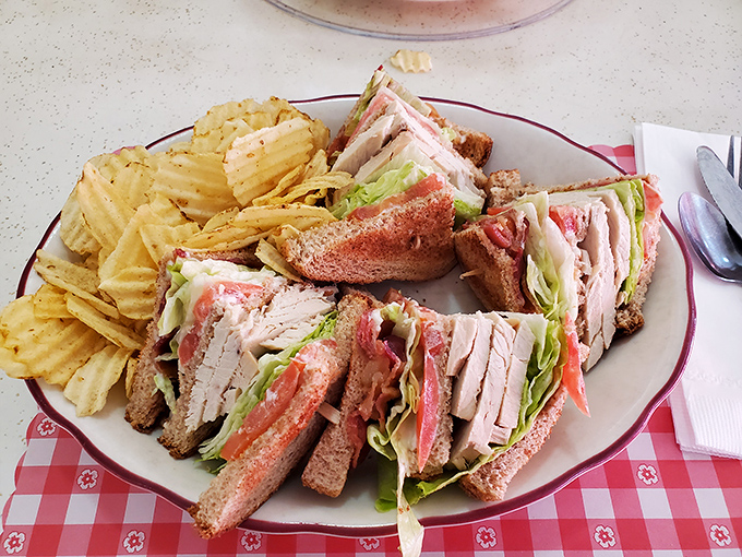 The club sandwich&mdash;architecture you can eat! Layers of turkey, bacon, and fresh veggies stacked so high you'll need to unhinge your jaw like a snake.