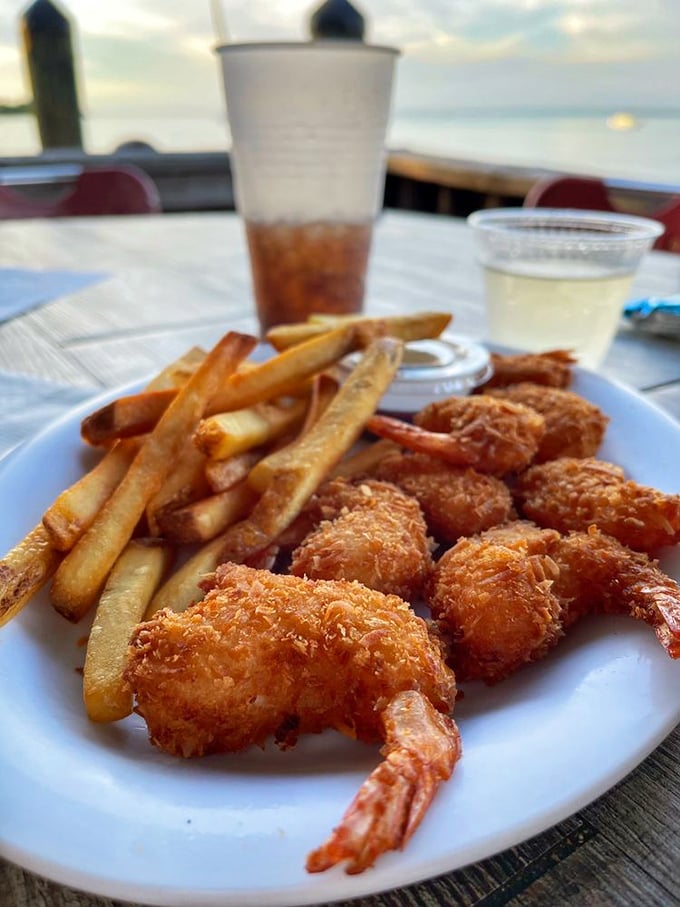 Coconut shrimp with the perfect crunch-to-sweetness ratio—like tropical armor protecting treasures of the sea.