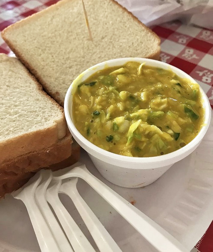 That mustard slaw deserves its own fan club. Bright, tangy, and the perfect counterpoint to rich smoked meat&mdash;it's the unsung hero of the plate.