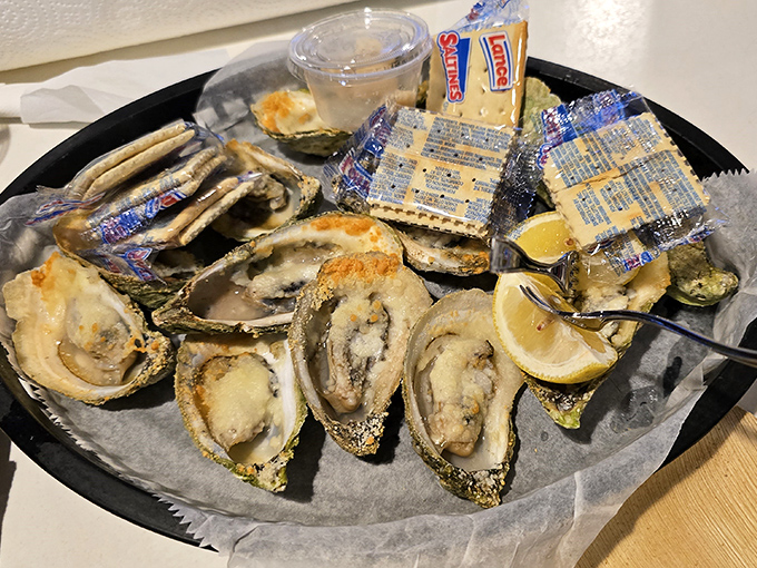 Apalachicola oysters lounging on ice like celebrities at a beach resort—briny treasures that taste like the Gulf itself.