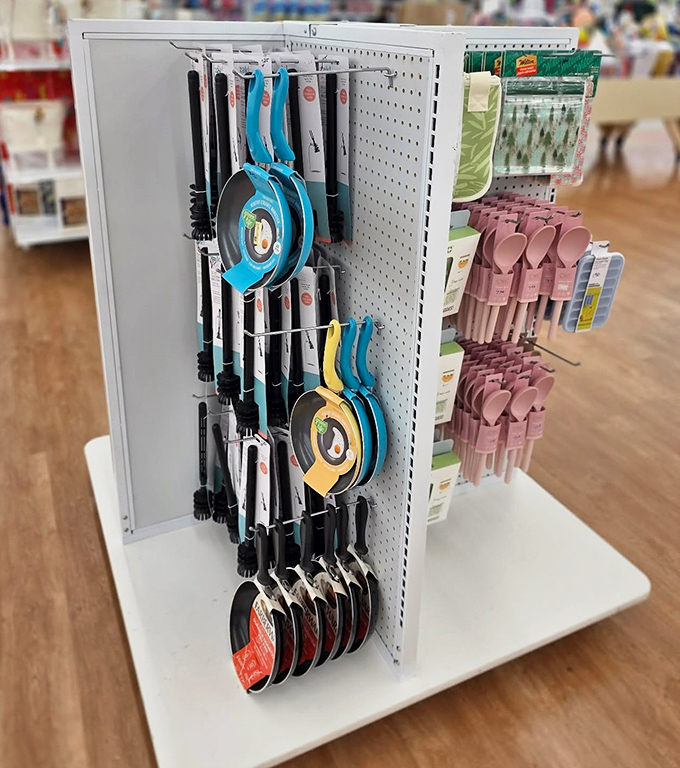 Kitchen utensils hanging like modern art installations. Even Julia Child would appreciate these colorful cooking tools at bargain basement prices.