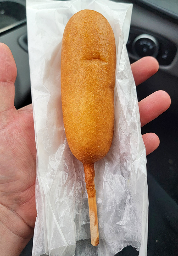 The corn dog stands at attention, golden-brown perfection on a stick &ndash; State Fair quality without the crowds.