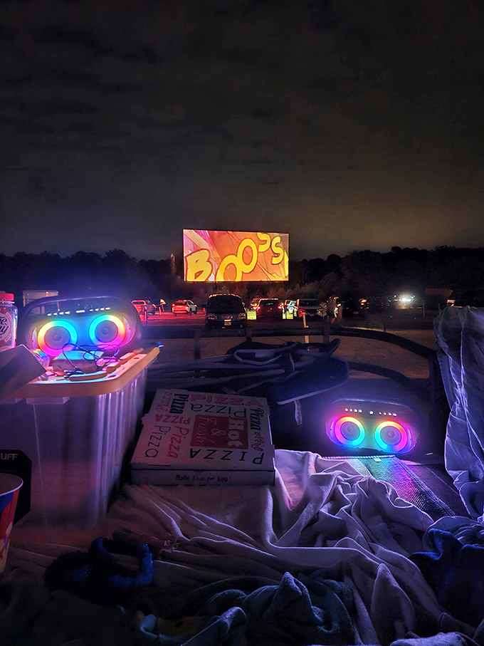 Movie night reimagined: pizza, portable speakers, and the perfect setup. Some drive-in veterans elevate the experience to an art form.