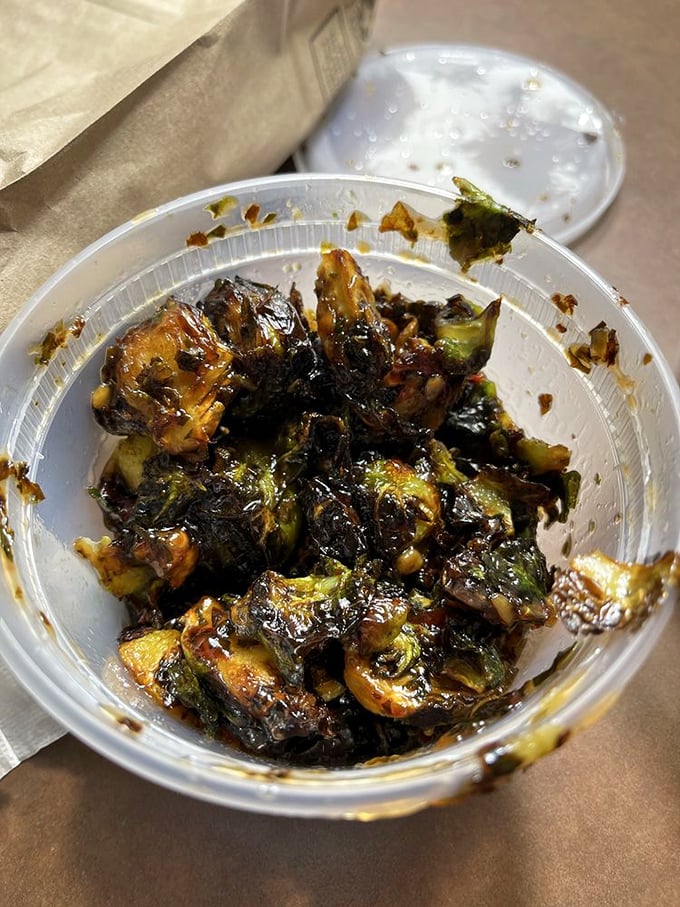 Brussels sprouts get the barbecue treatment here, proving that even vegetables can join the smoke-kissed party.