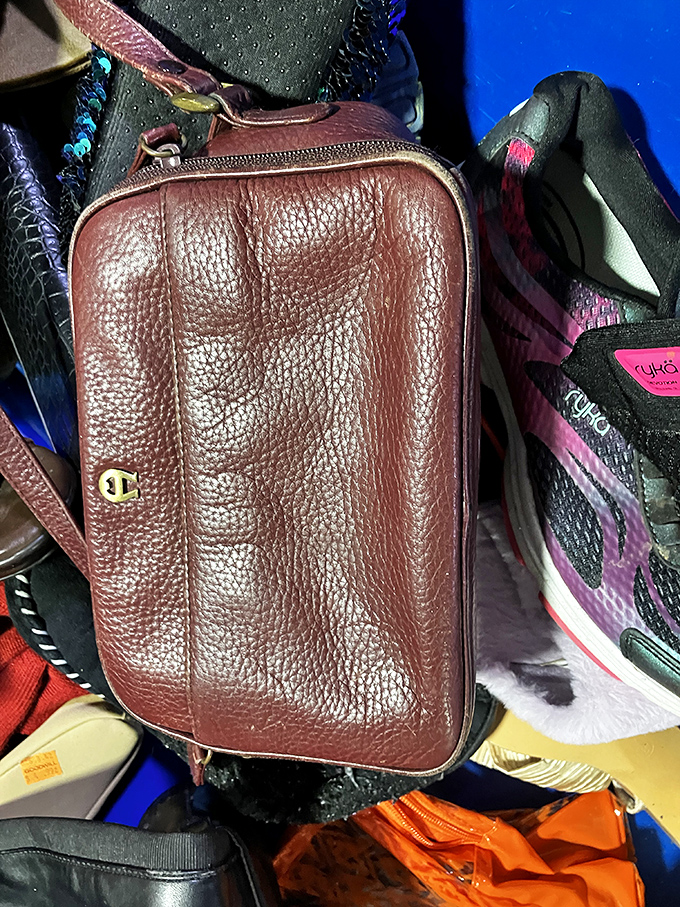 Designer bags hide among the everyday finds, waiting for eagle-eyed shoppers to claim their prize.