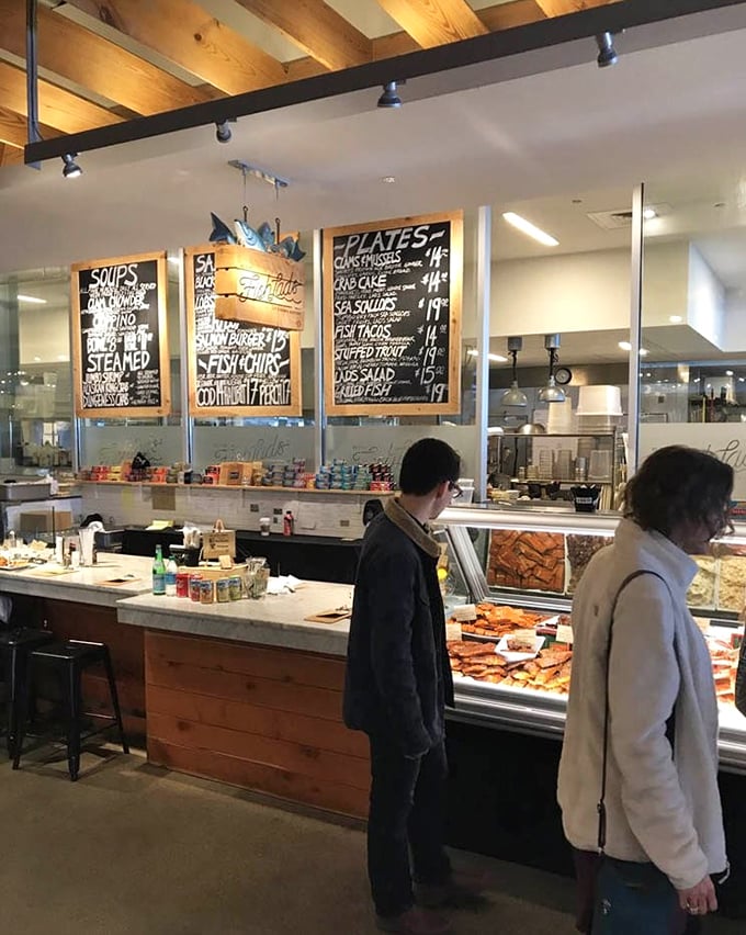 The best food experiences often happen at counters like this, where the barrier between kitchen and customer is delightfully thin.