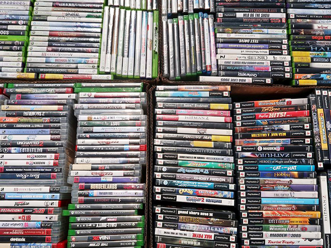 Video game history arranged in perfect rows. Before streaming and downloads, these plastic rectangles were portals to other worlds.