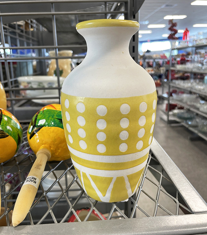 This sunny yellow polka-dot vase is just waiting to brighten someone's windowsill. Mid-century charm at secondhand prices!