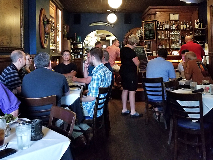 The dining room hums with the universal language of "mmm." Where strangers become united in the brotherhood of breaking bread and cracking shells.