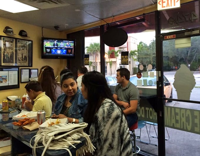 The weekend crowd proves Sweet Dogs' universal appeal&mdash;where Miami locals gather to debate sports, politics, and the perfect hot dog topping.