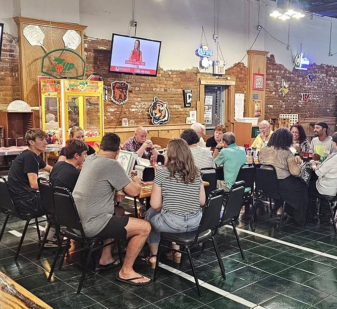 A dining room filled with locals who know the secret: good food brings good people together, no matter how simple the surroundings.