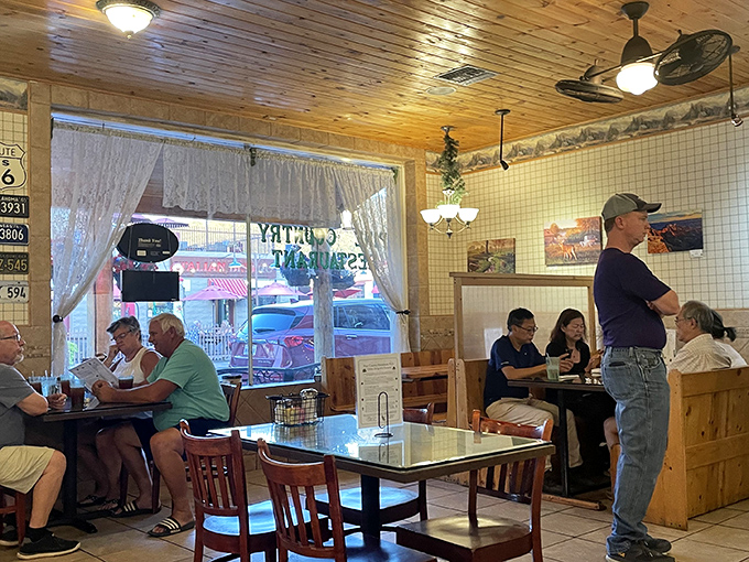 Where locals and travelers break bread together under pine ceilings. The conversations at neighboring tables are as authentic as the food&mdash;pure small-town America.