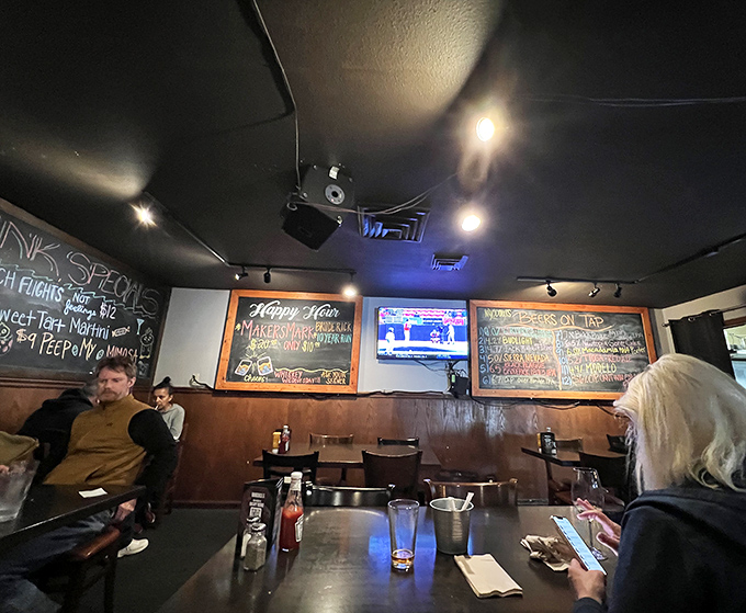 The bar area buzzes with conversation and anticipation. This is where food dreams are hatched and happy hour promises are kept.
